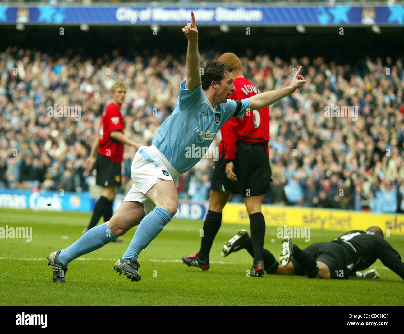 Manchester City's Robbie Fowler celebrates scoring the opening goal ...