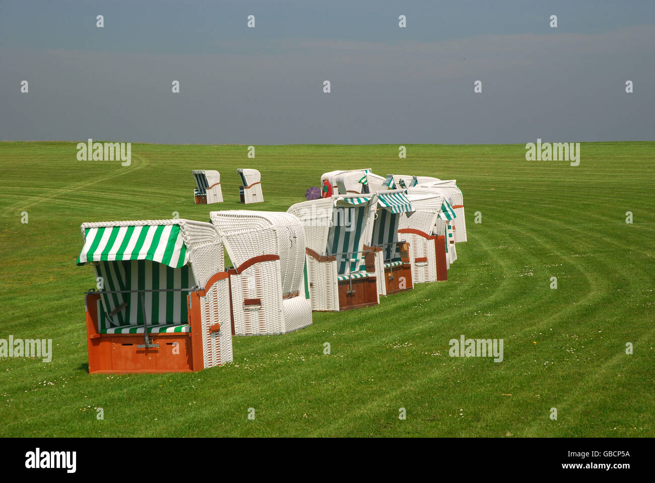 Wicker beach chairs at dike, Nordstrand, Schleswig-Holstein, Germany ...