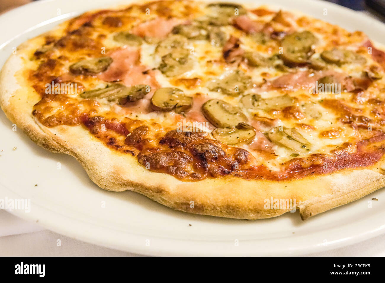 Pizza - Italian food in a pizzeria Stock Photo - Alamy