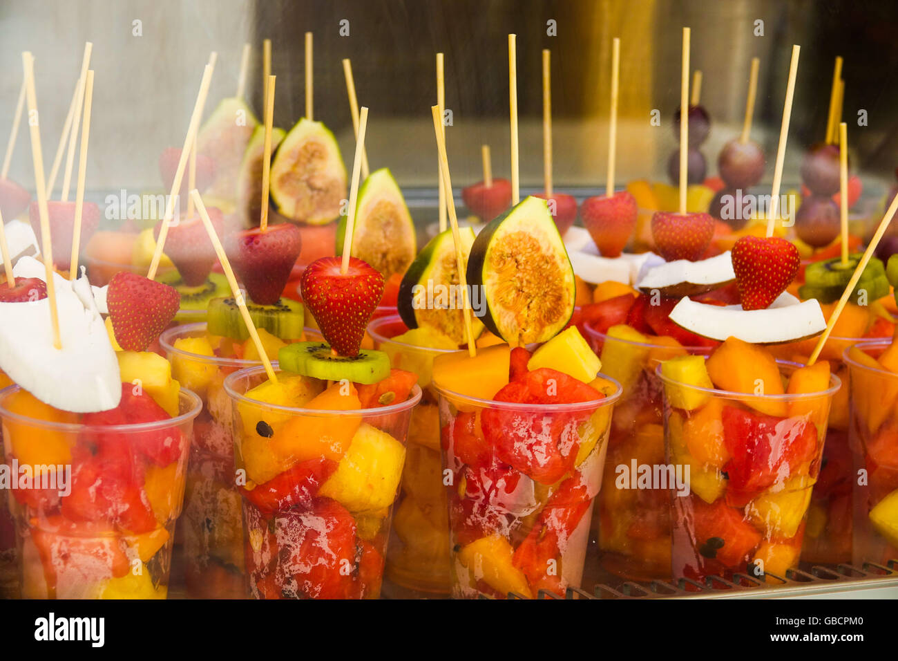 A cup of mixed fruits - fruit cocktail to go Stock Photo - Alamy
