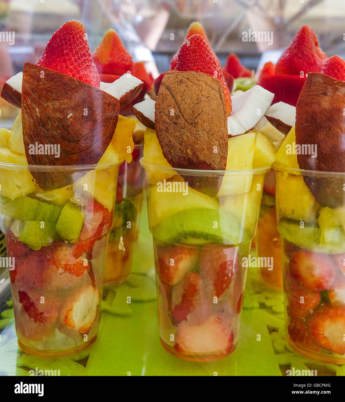 A cup of mixed fruits - fruit cocktail to go Stock Photo - Alamy