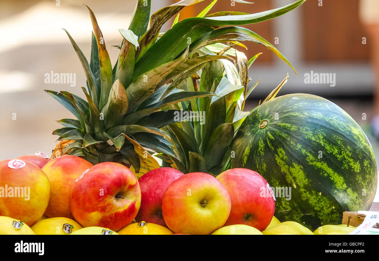 Fruit selection - apple and melon Stock Photo - Alamy