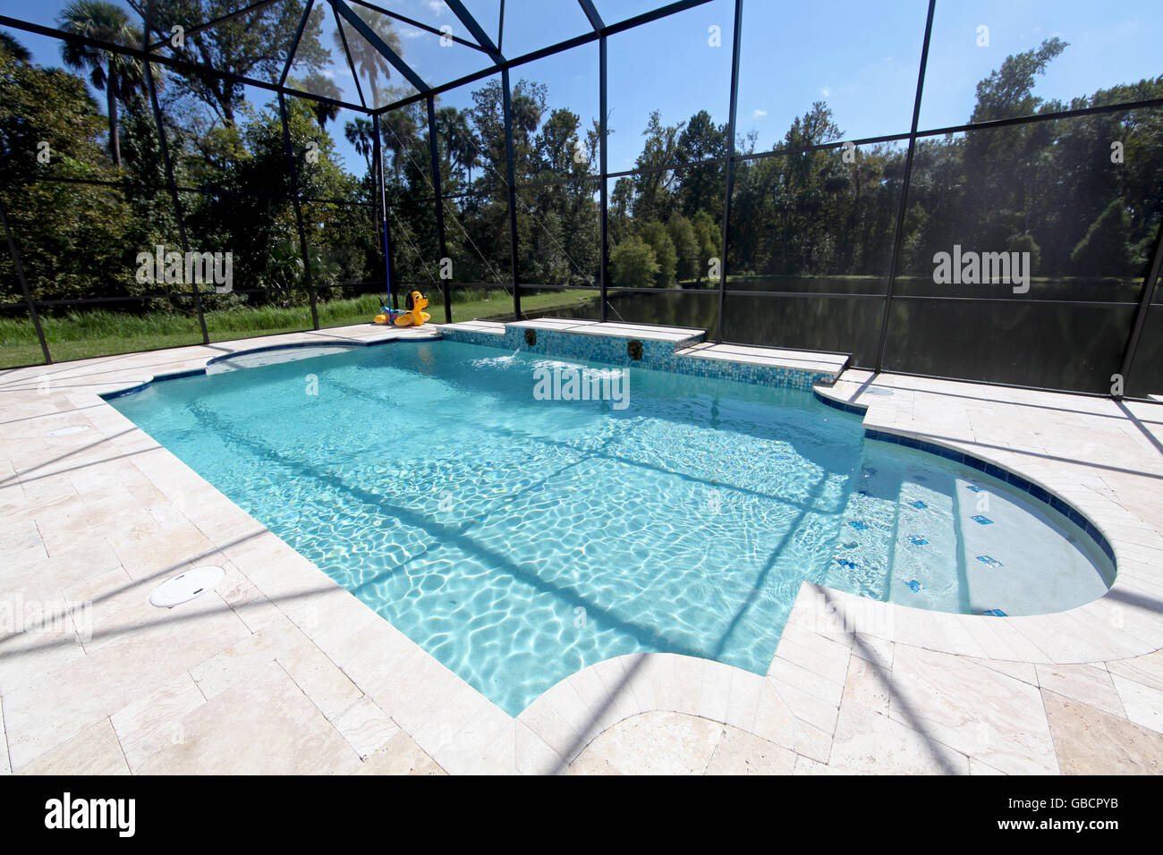 A new Swimming Pool with Lake View in Florida Stock Photo - Alamy