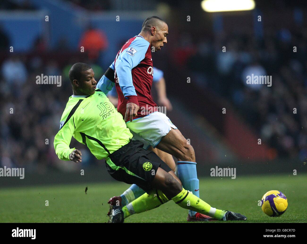 Wigan Athletic's Titus Bramble and Aston Villa's John Carew (right ...