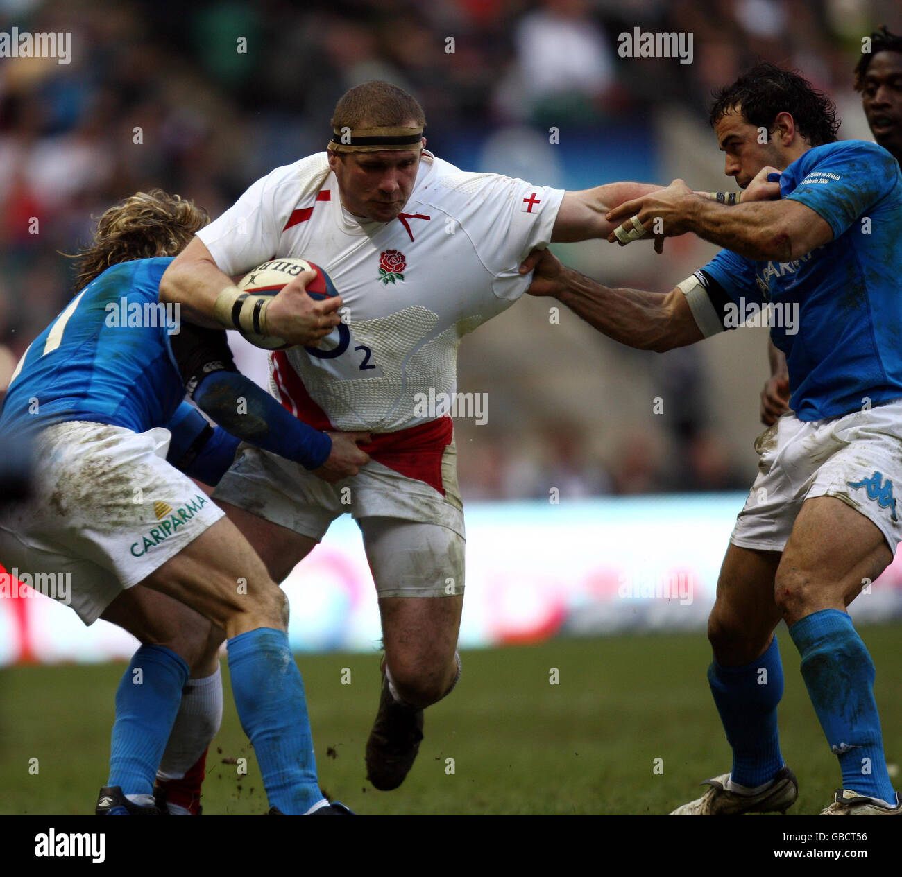England's Phil Vickery tries to muscle his way through the Italian ...