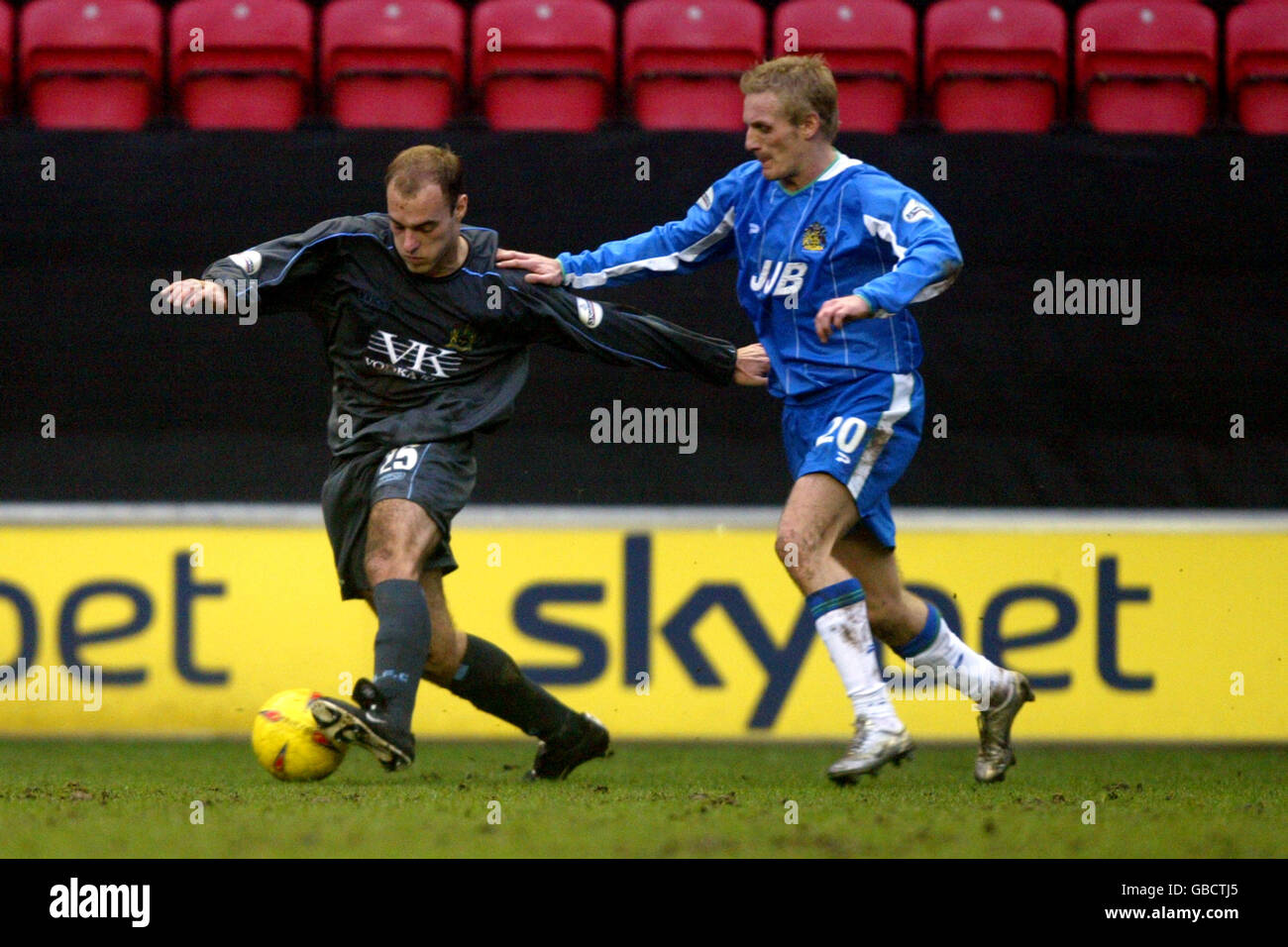 Burnleys neil wood wigans gary teale battle for the ball hi-res stock ...