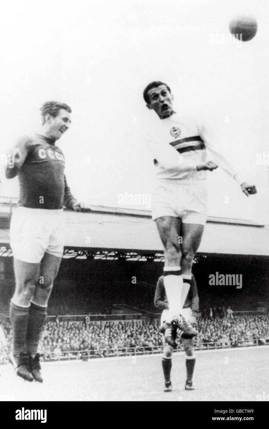 (L-R) USSR's Vasiliy Danilov heads clear from Hungary's Florian Albert ...