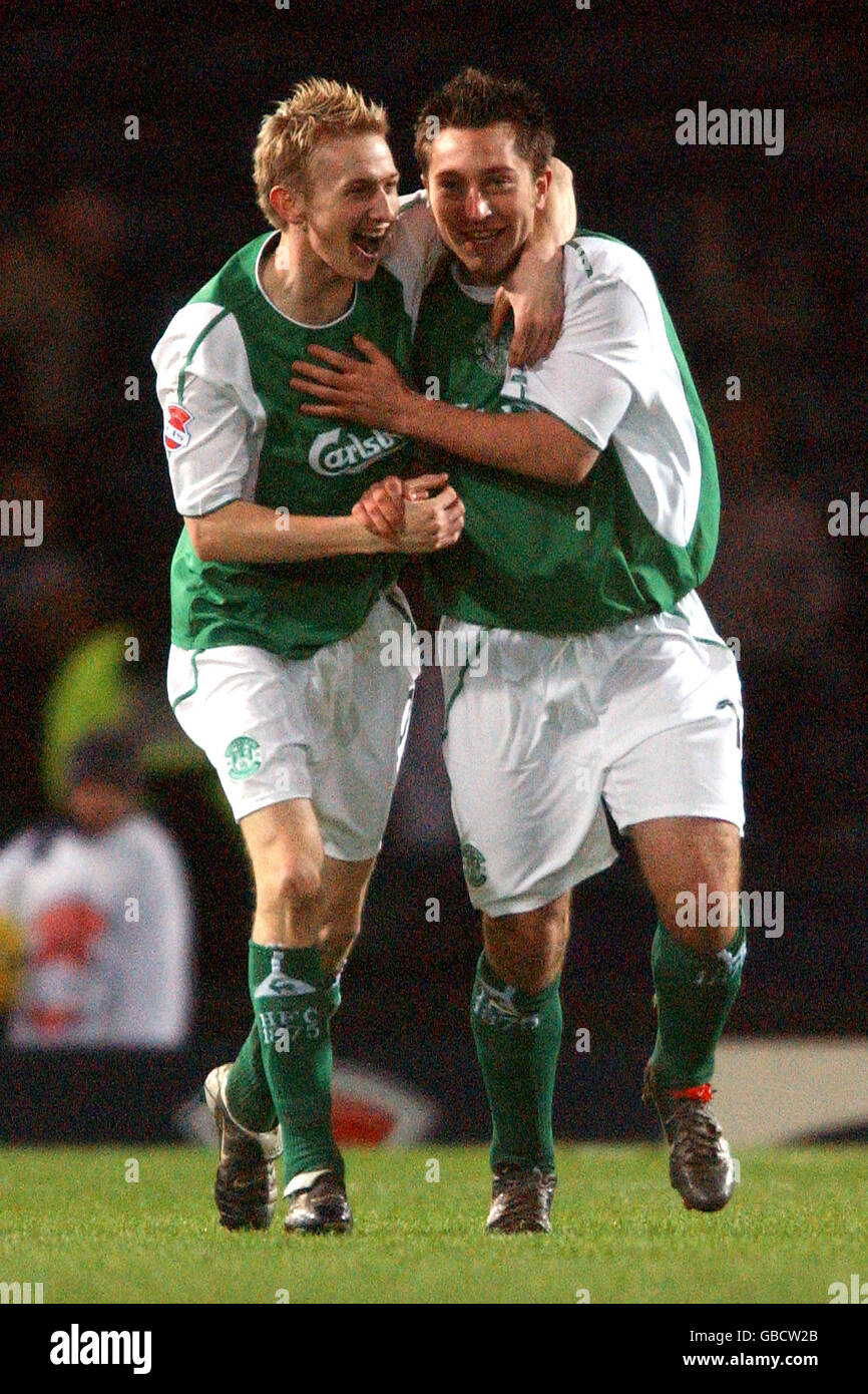 r-l; Hibernian's Stephen Dobbie is congratulated on scoring the ...
