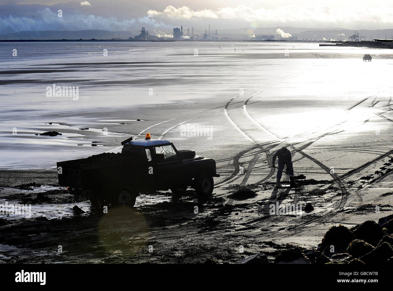 Sea coal digging Stock Photo - Alamy