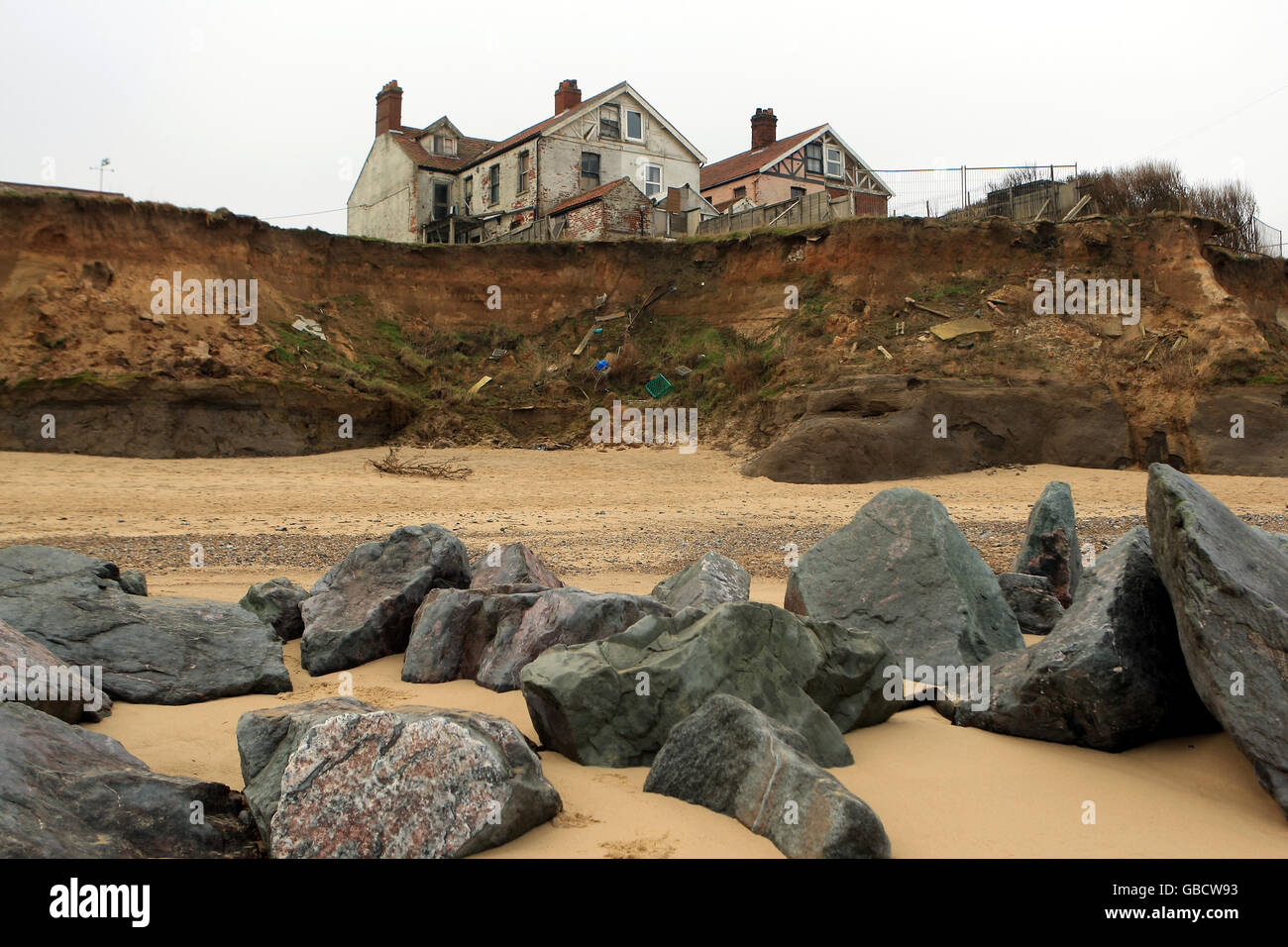 A general view of houses close to cliffs at Happisburgh. Large chunks ...