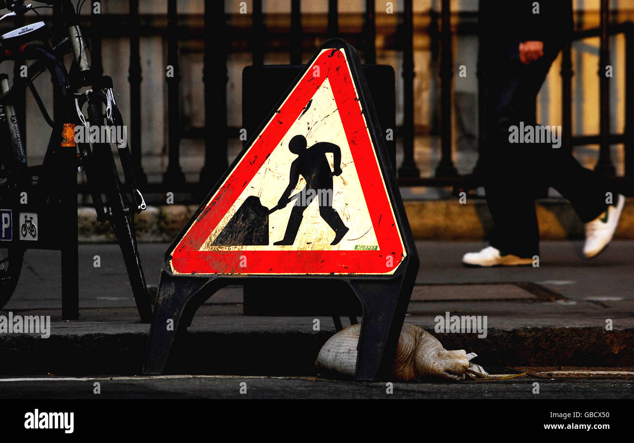 Men at work sign Stock Photo - Alamy