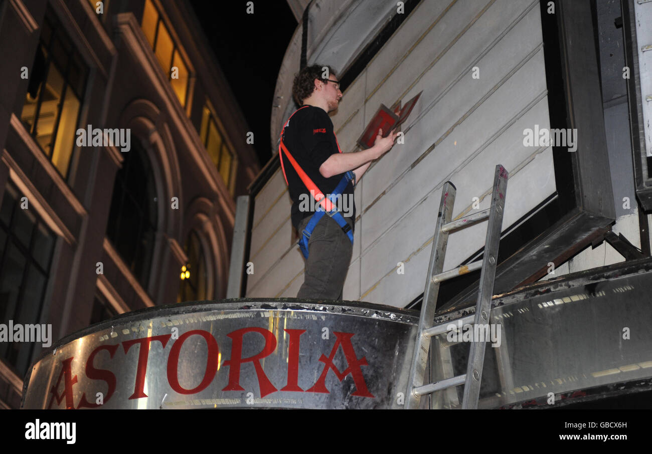 The lettering at the entrance to the venue is taken down for the final ...