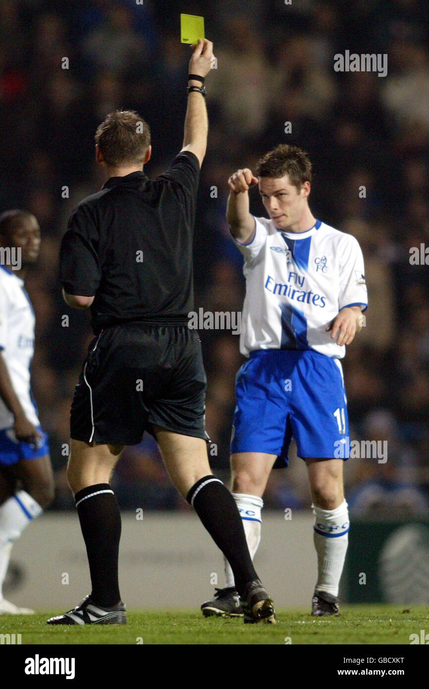 Chelsea's Scott Parker (r) is booked by referee Graham Poll (l Stock ...