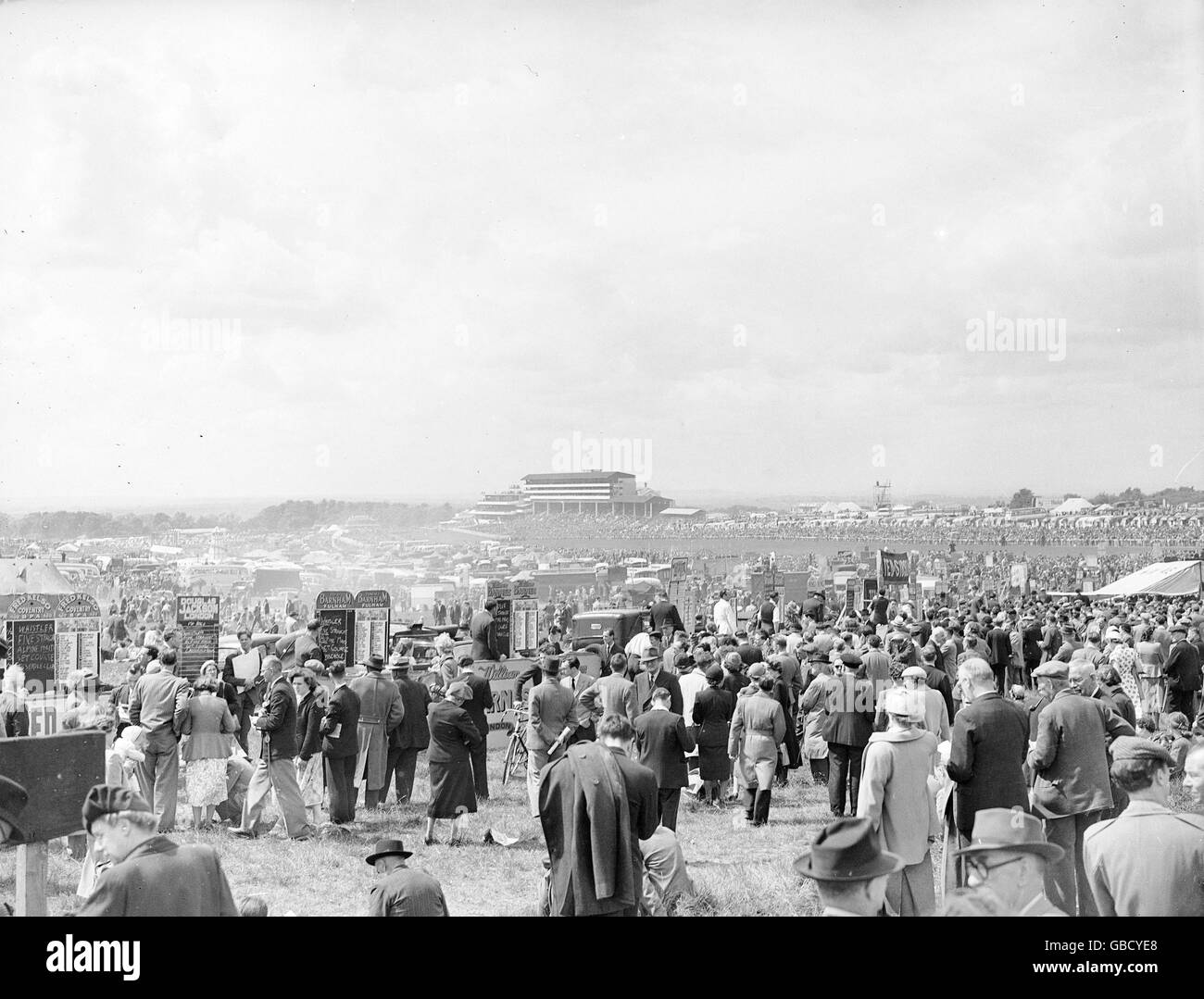 A general view across the heath showing bookmakers stands, the course ...