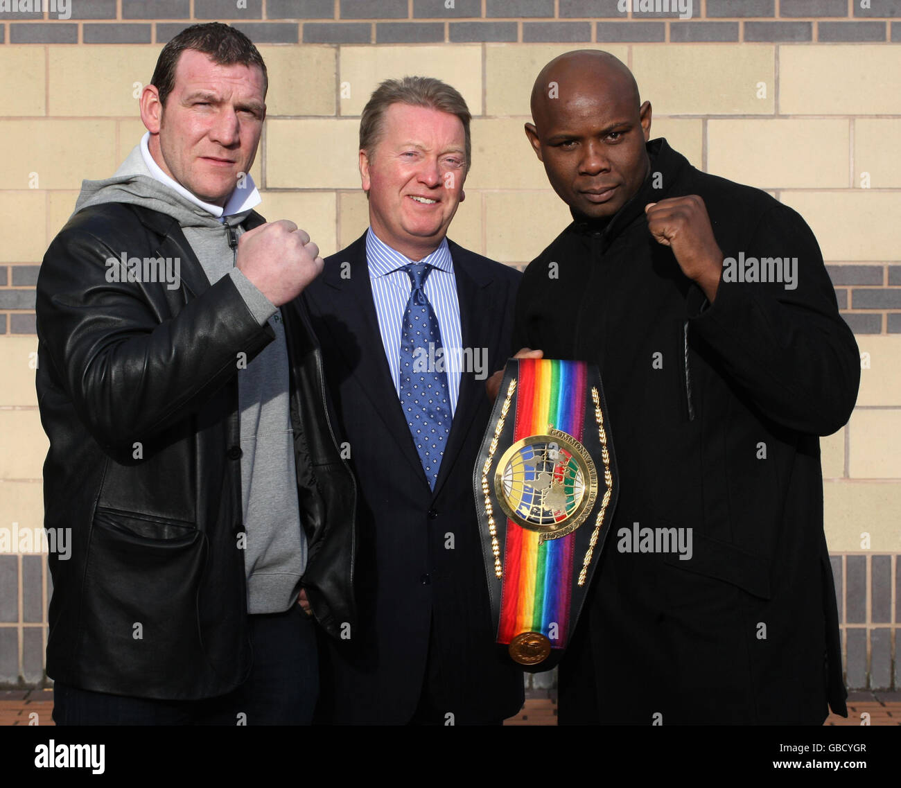 Boxing Promoter Frank Warren (centre) stands with Martin Rogan and ...