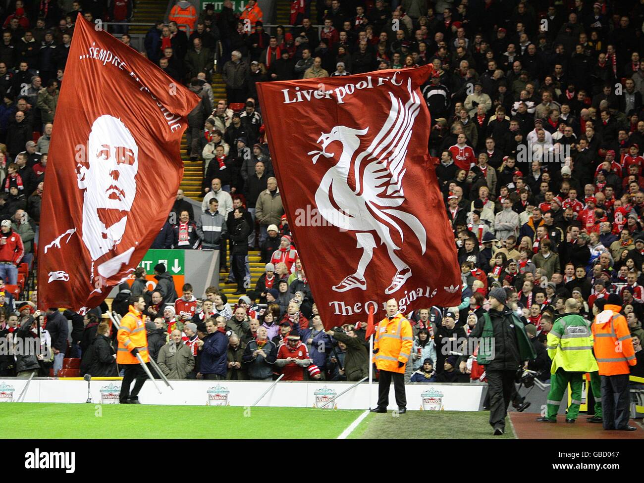 Liverpool flags depicting manager Rafael Benitez (left) and the ...