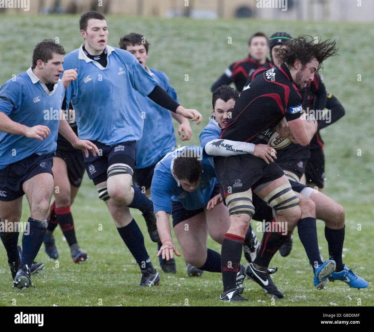 Robbie Johnston of Scotland U20 tackles Edinburgh lock Ian Nimmo Stock ...