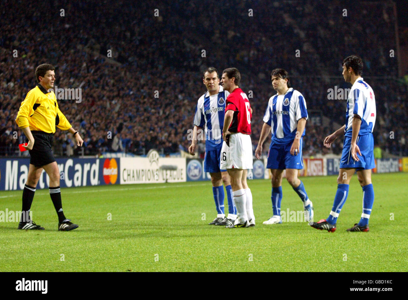 Manchester United's Roy Keane (c) is about to be shown the red card by ...