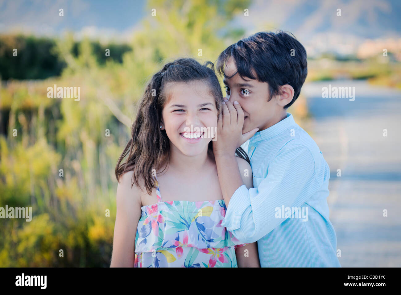 Whispering hi-res stock photography and images - Alamy