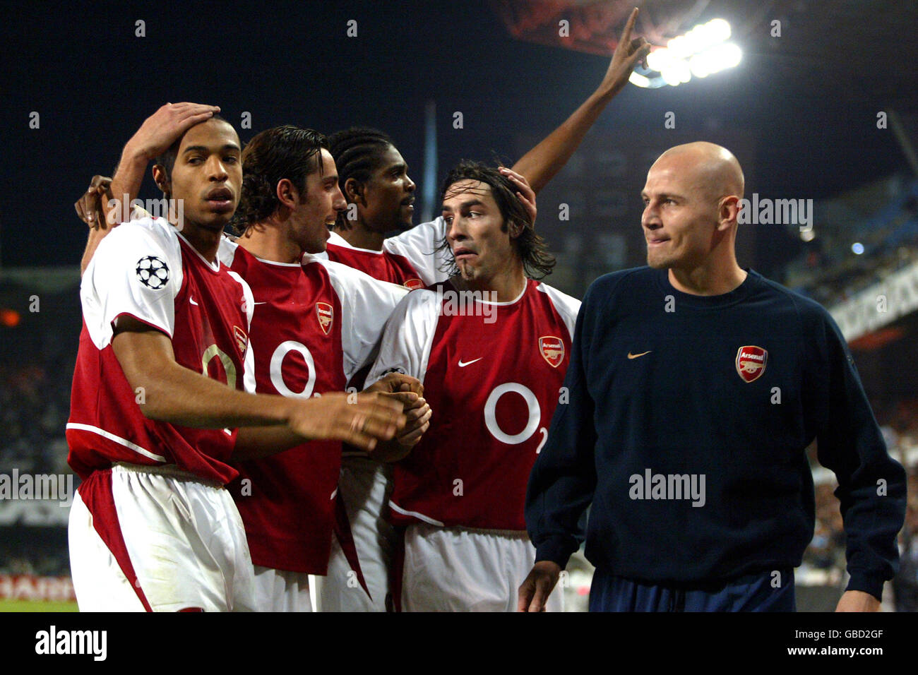 Robert pires and substitute pascal cygan celebrate the winning goal hi ...
