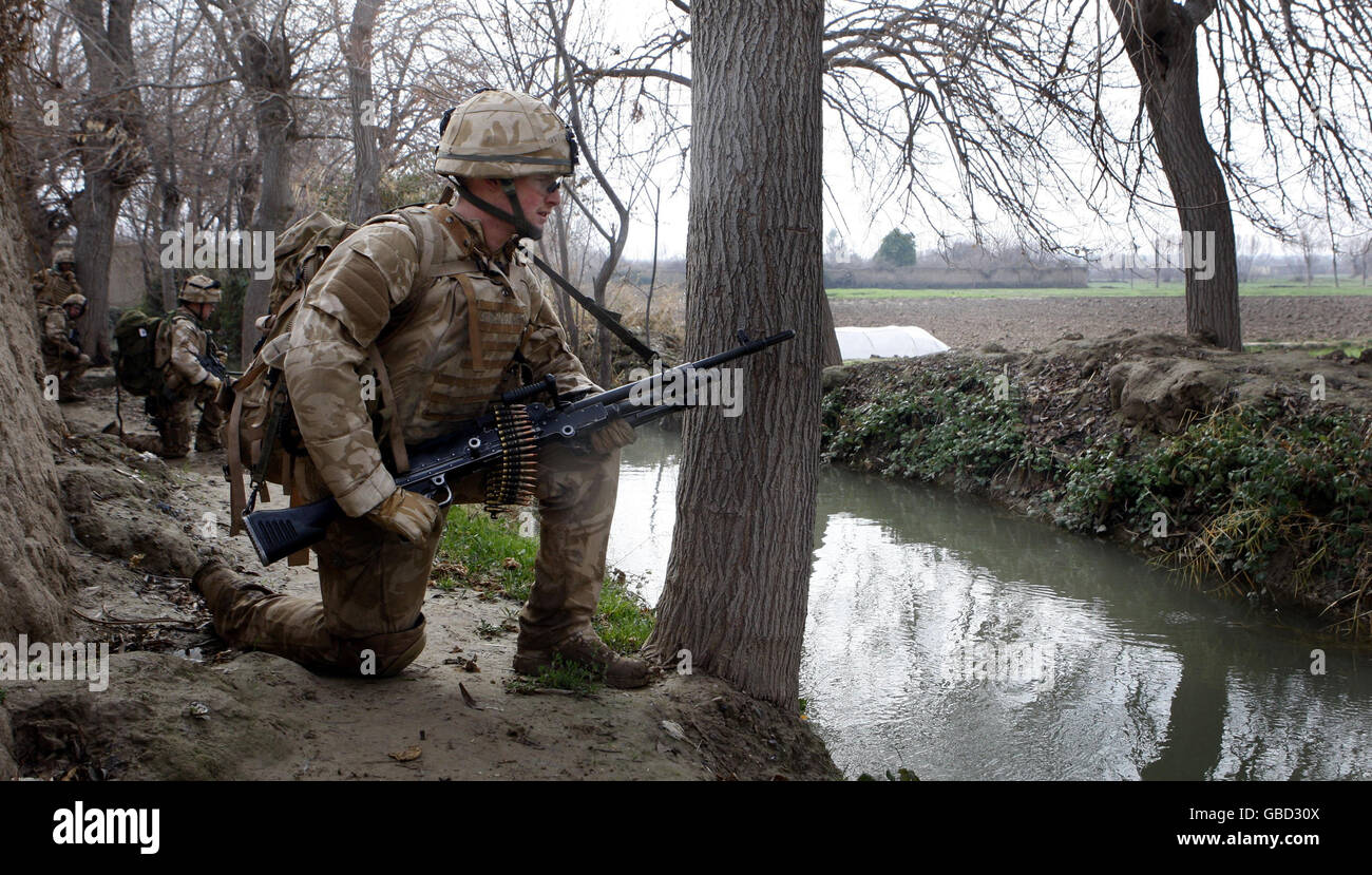 Royal Marines from 45 Commando during a patrol in the Sangin district ...