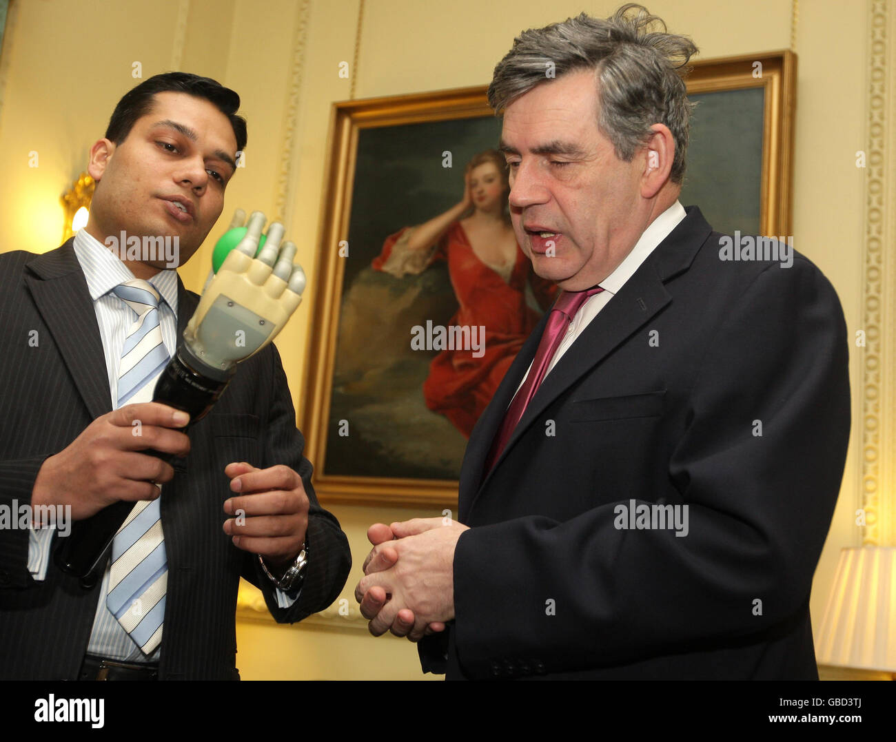 Gaurav Mishra (left), Director of Touch Bionics, shows Prime Minister ...