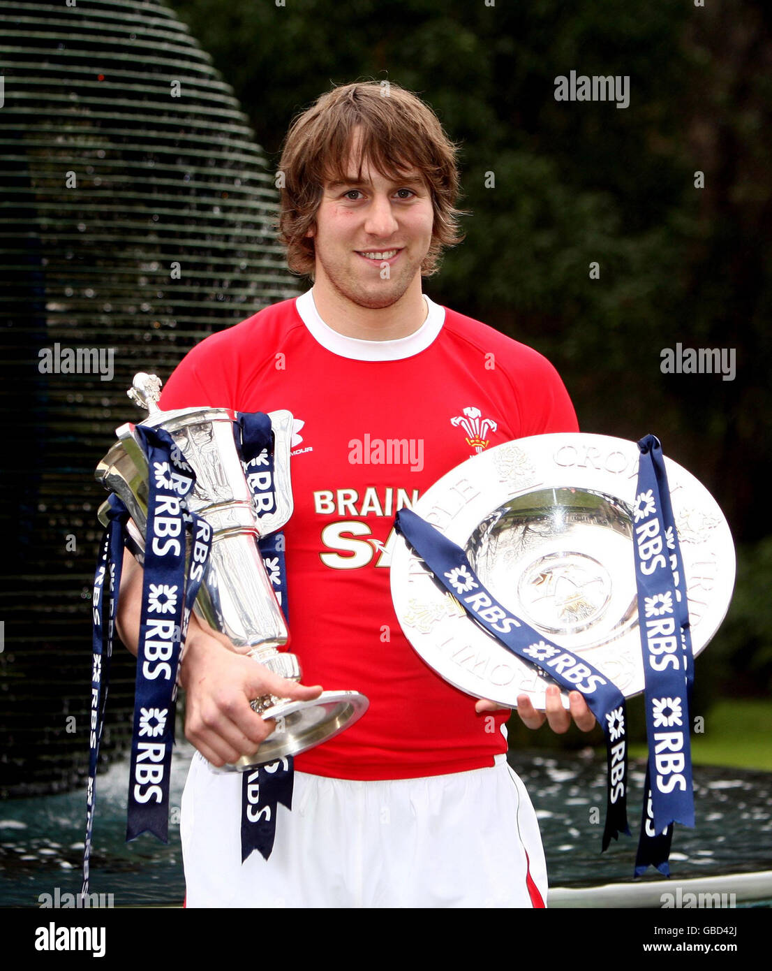 Wales captain Ryan Jones holds the RBS Six Nations Trophy during the ...