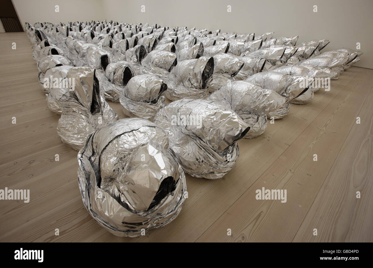 Ghost, a group of Muslim women in prayer made out of foil, by artist ...