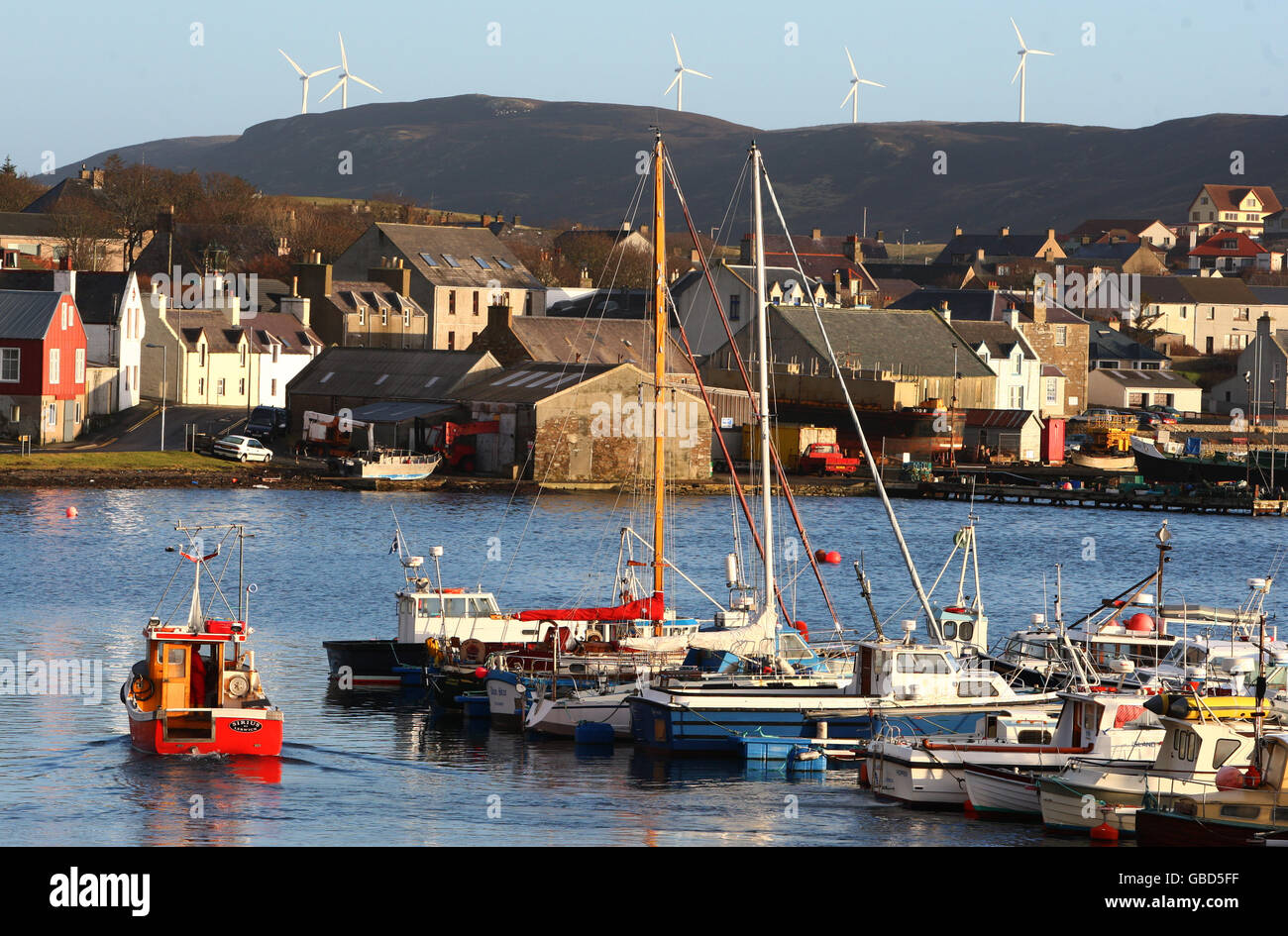 A general view of the town of Scalloway on Shetland Islands, with wind ...