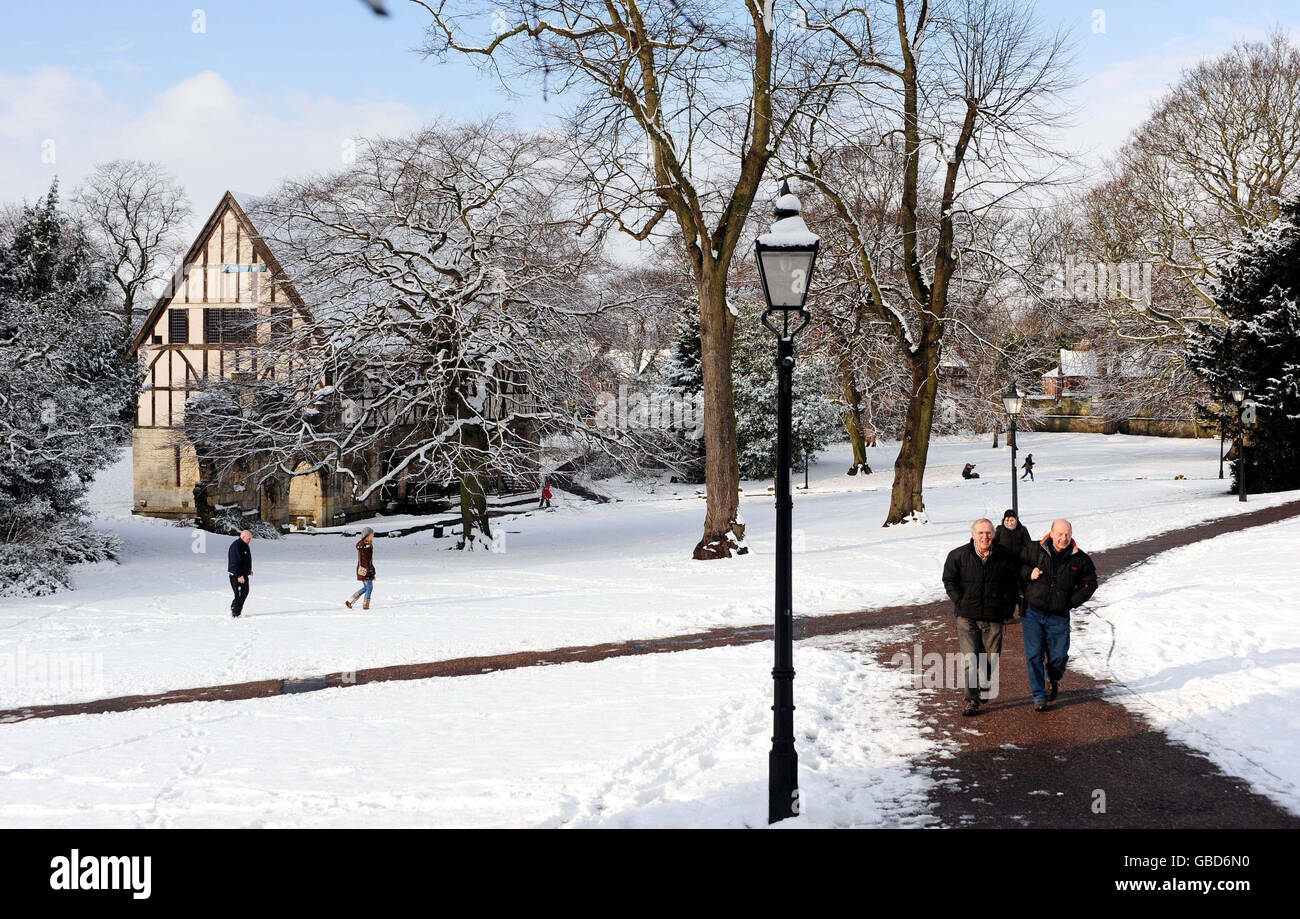 Visitors enjoy a walk through the snow covered Museum Gardens in York ...