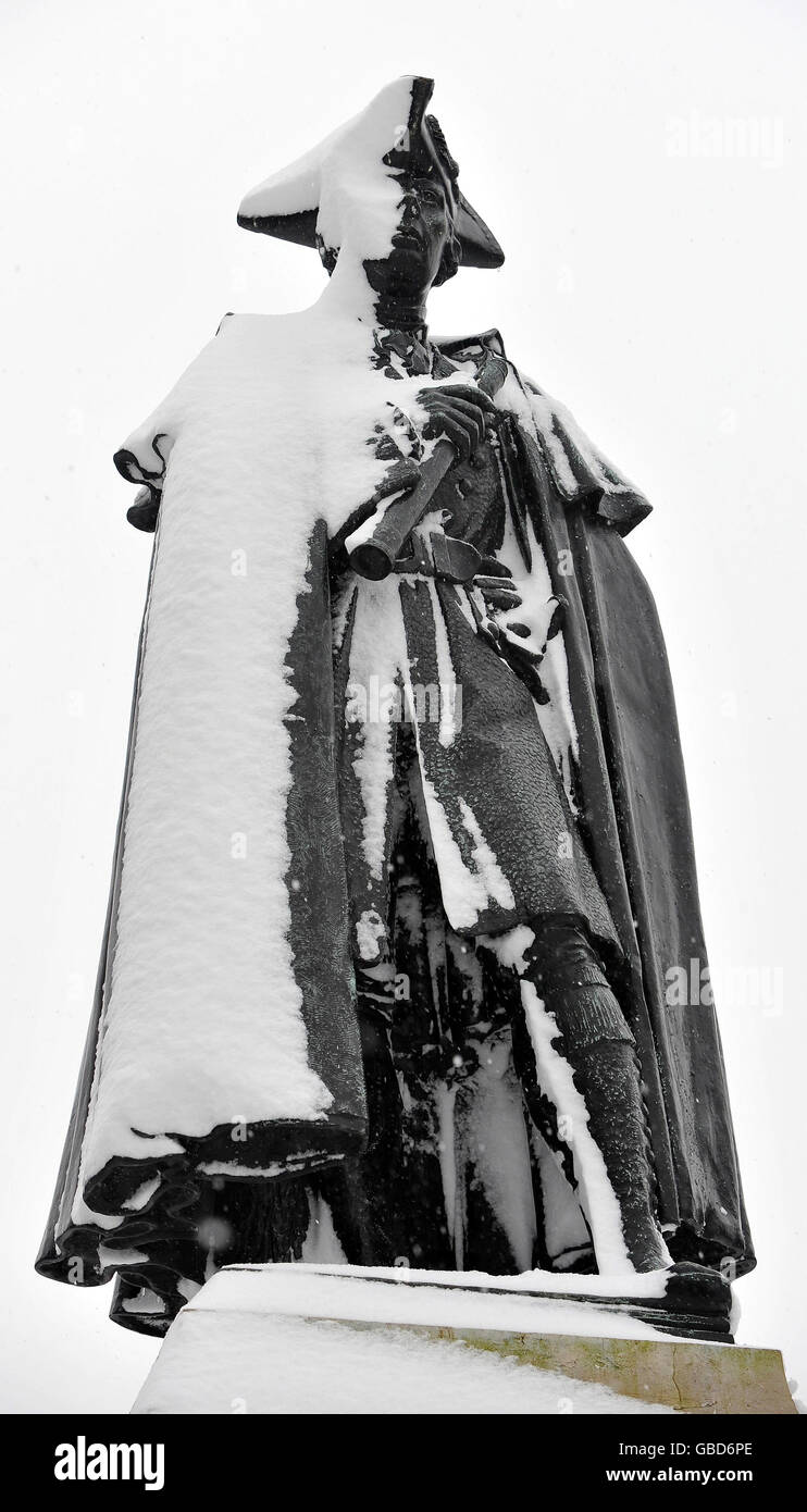 The snow covered statue of General Wolfe in Greenwich Park south east ...