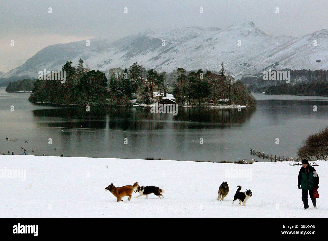 People walk on the snow in Crow Park, Keswick, Cumbria Stock Photo - Alamy