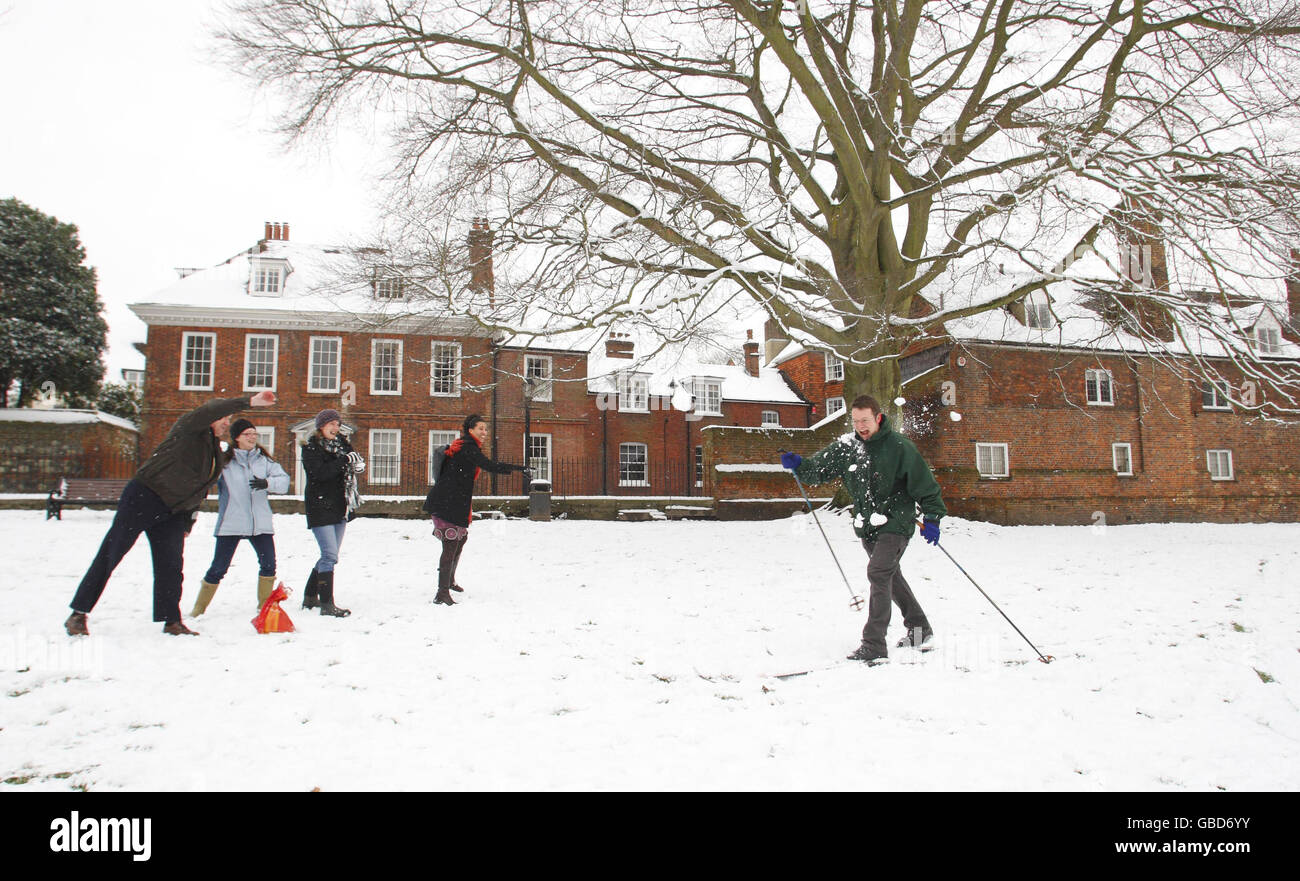 Alex Wardle is pelted with snowballs by colleagues as he heads to work ...