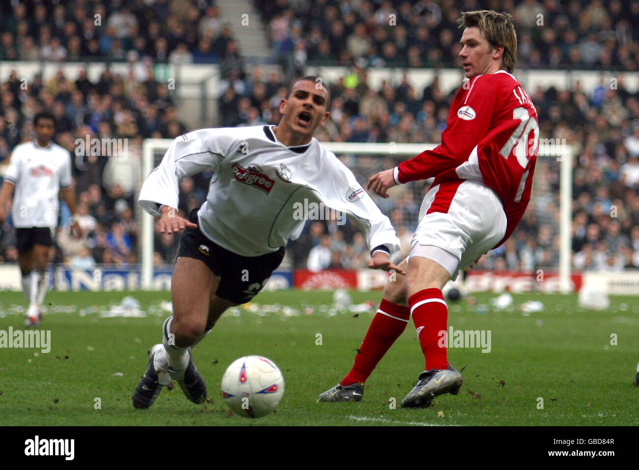 Derby County's Marcus Tudgay is tripped by Nottingham Forest's Gareth ...