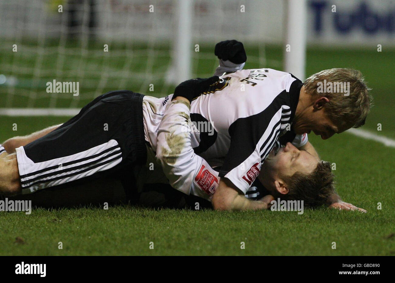 Derby County's Kris Commons celebrates his goal with Gary Teale (top ...
