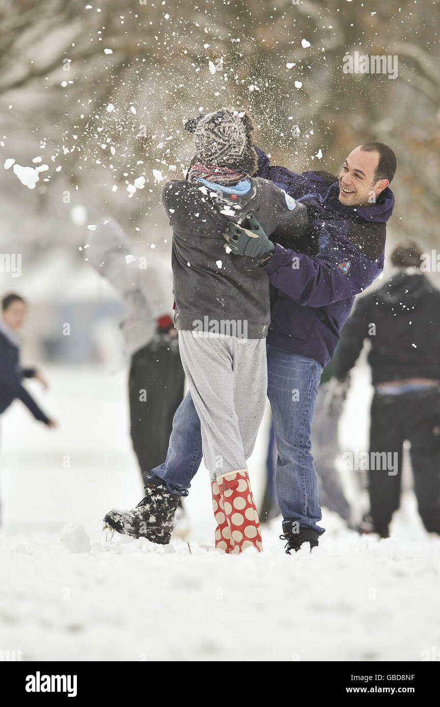 People throw snowballs in Victoria Park, Windmill Hill, Bristol after a ...