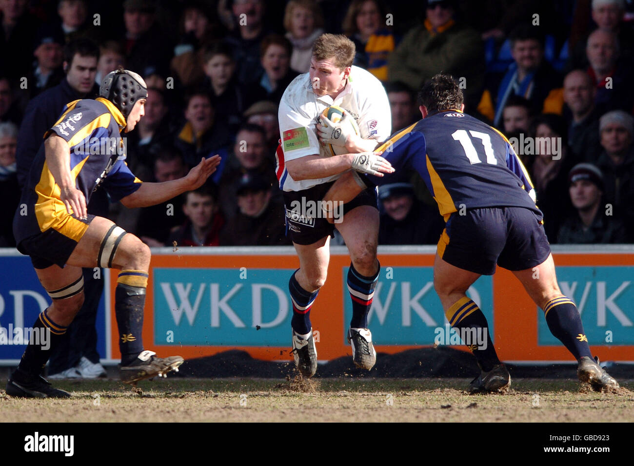Sale Sharks' Steve Hanley (c) is closed down by Leeds Tykes' Dan Hyde ...