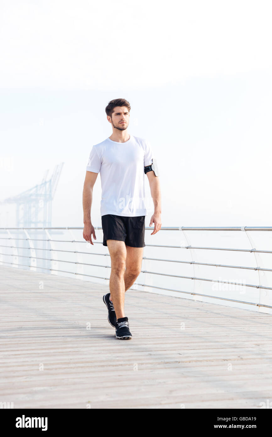 Fit young man walking alone hi-res stock photography and images - Alamy