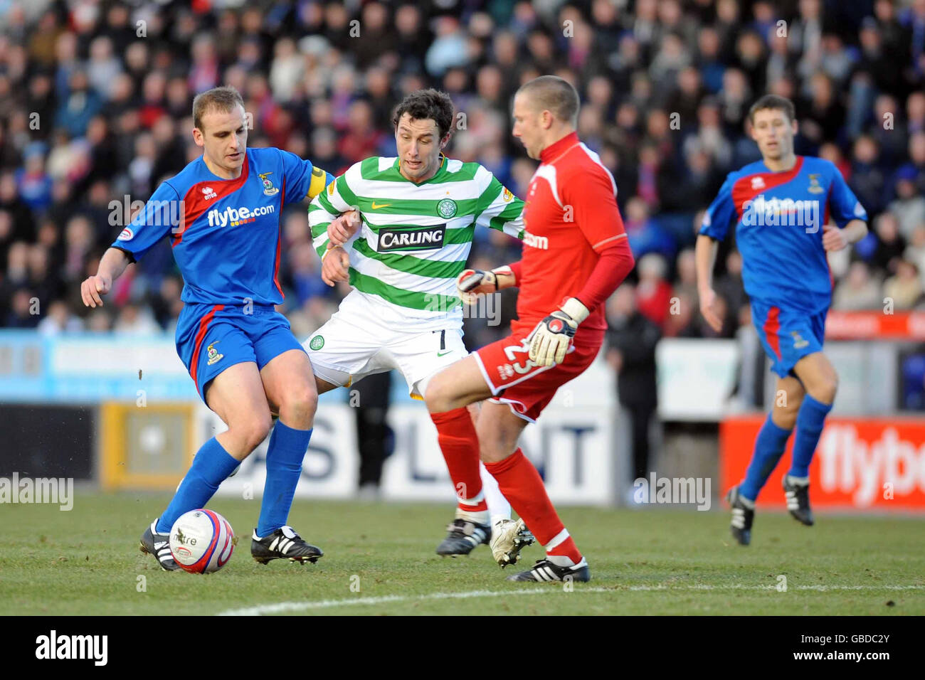 Celtic's Scott McDonald comes under pressure from Inverness' Grant ...