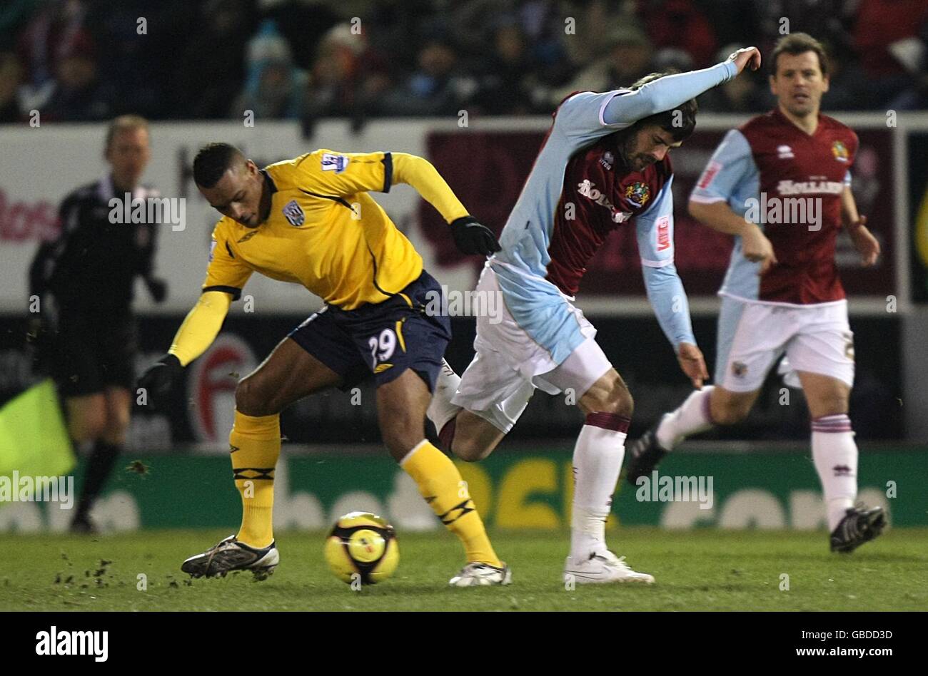West Bromwich Albion's Jay Simpson (left) and Burnley's Steven Thompson ...
