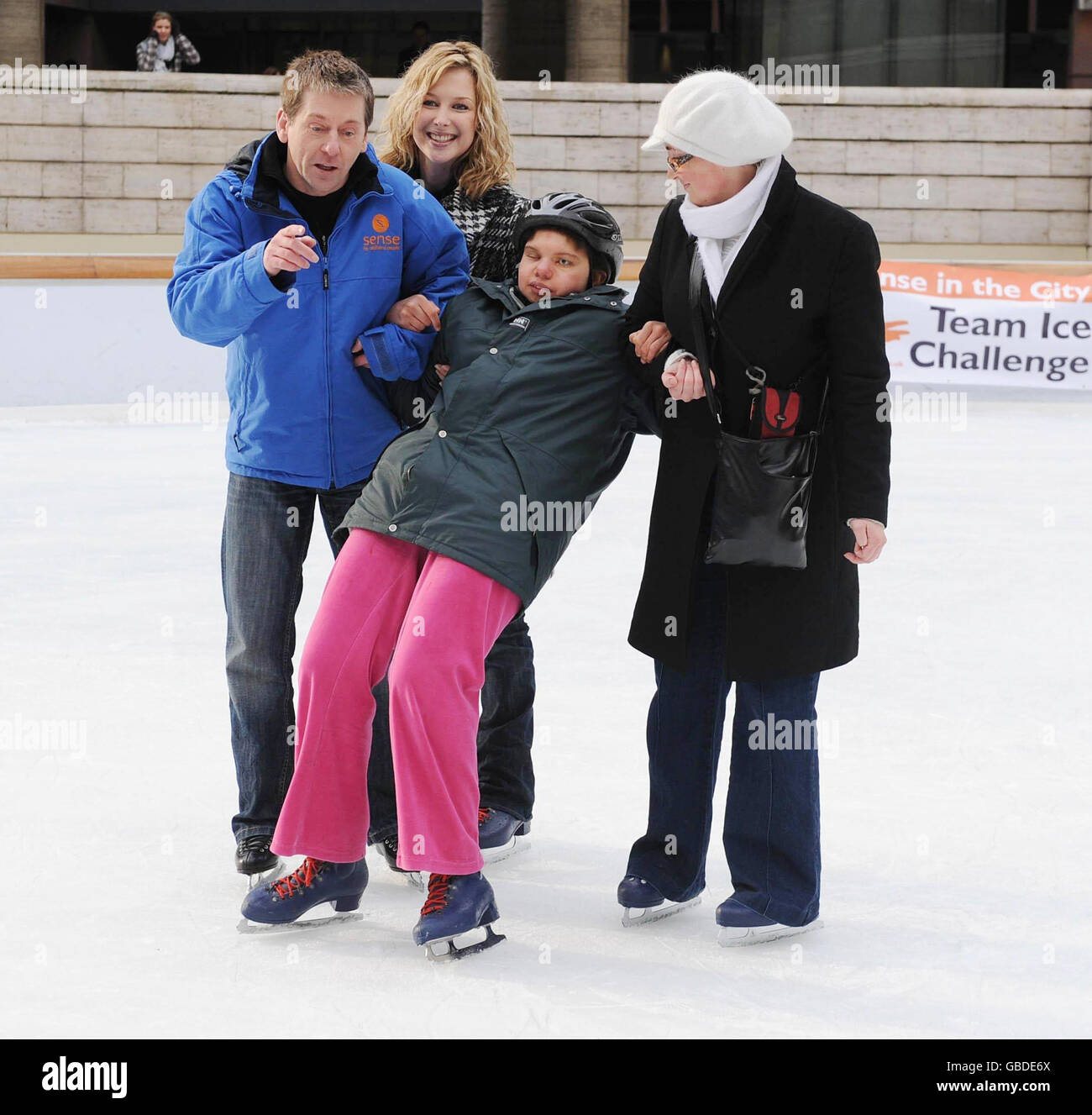 Nicky Slater (left) and Gemma Bissix (2nd left) teach deaf/blind woman ...