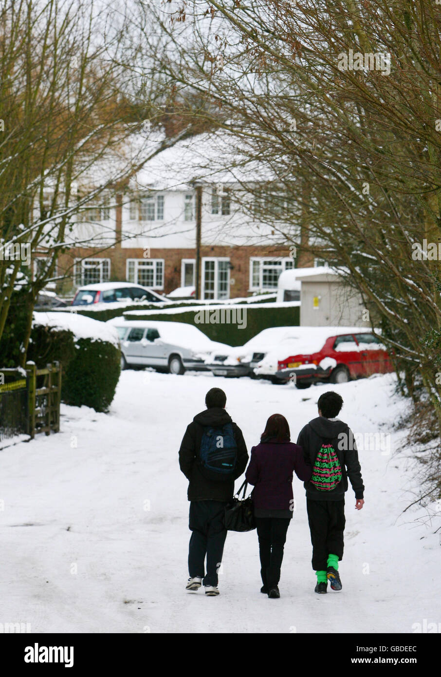 Winter weather. Students walk though Wadhurst in Kent after snow swept ...