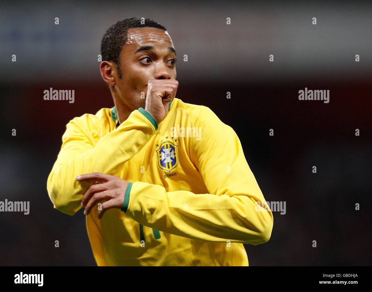 Brazils robinho celebrates scoring hi-res stock photography and images ...