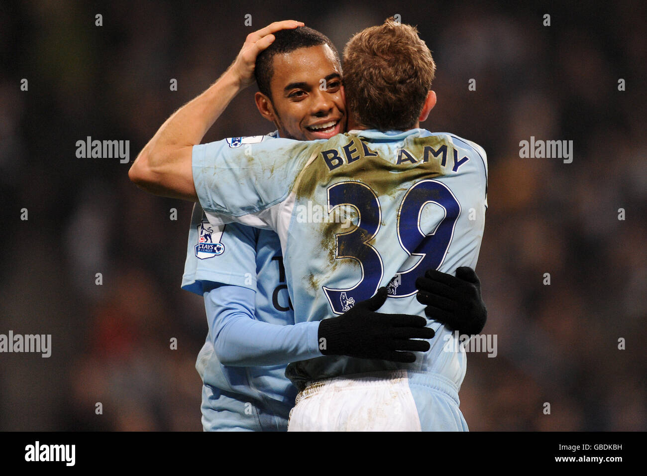 Manchester City's Robinho (left) congratulates team mate Craig Bellamy ...