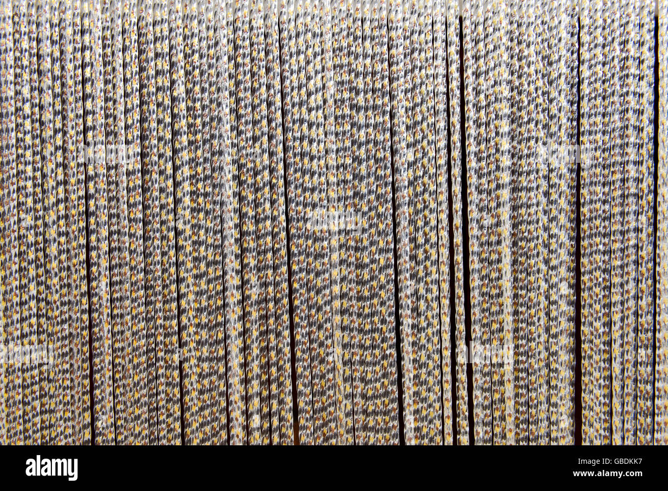 Threads of plastic for backgrounds Stock Photo - Alamy