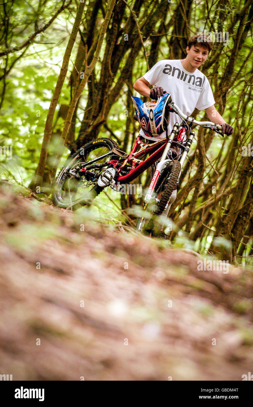 Young BMX bike rider on a trail in woods in southern England Stock Photo - Alamy