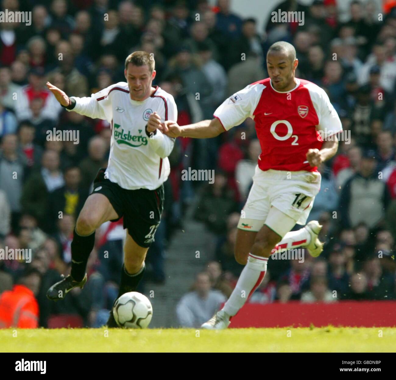 Arsenal's Thierry Henry (r) and Liverpool's Jamie Carragher (l Stock ...