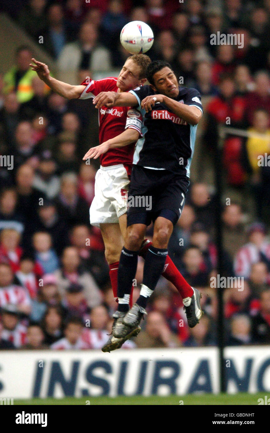 (L-R) Nottingham Forest's Michael Dawson and Stoke City's Carl Asaba ...