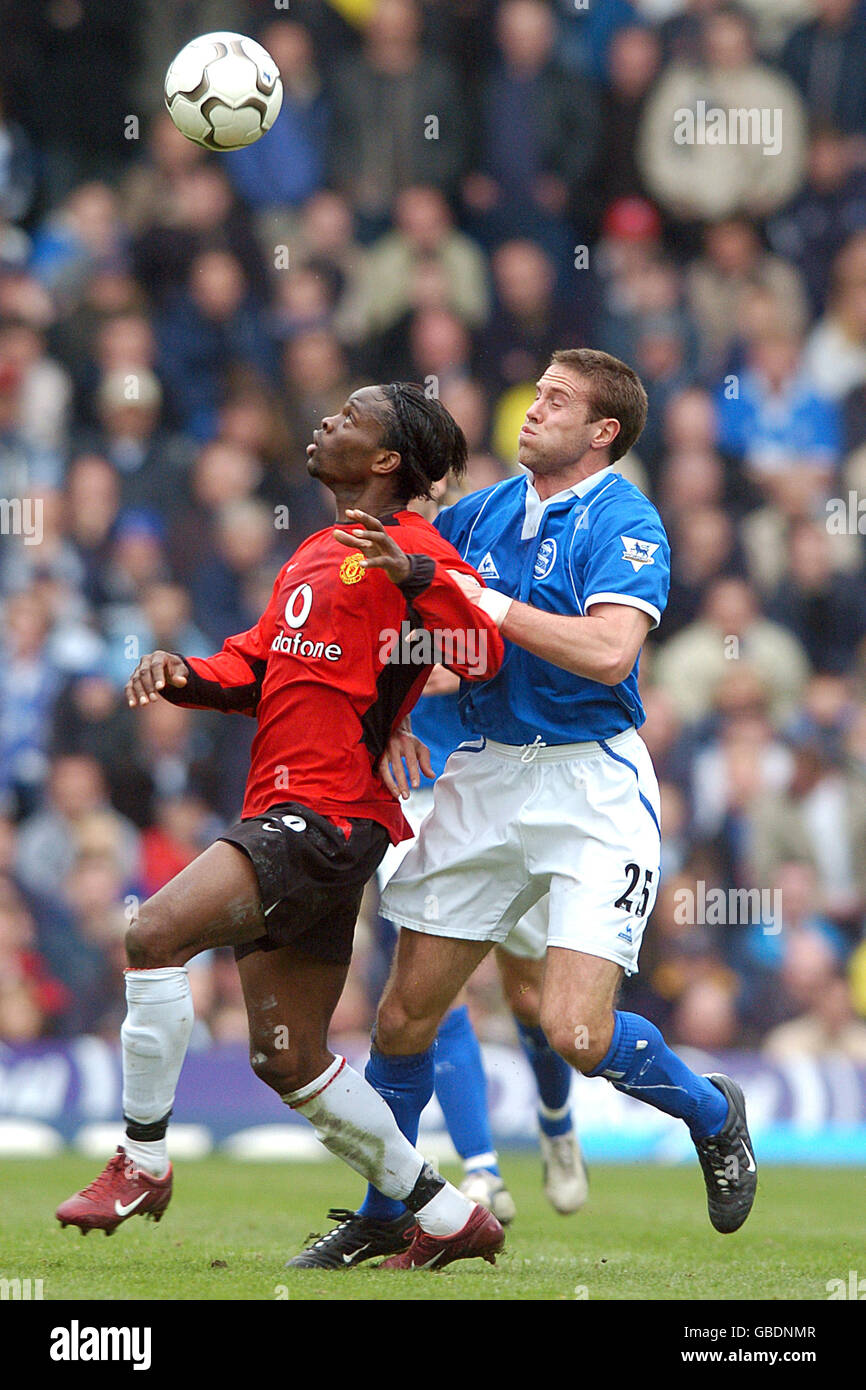 Birmingham City's Matthew Upson challenge is held off by Manchester ...