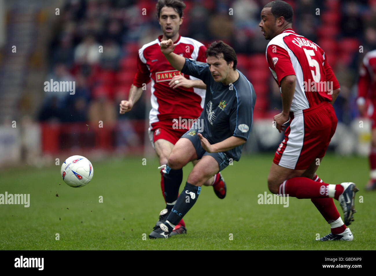 Walsall's Matt Carbon (R) and Burnley's Robbie Blake battle for the ...
